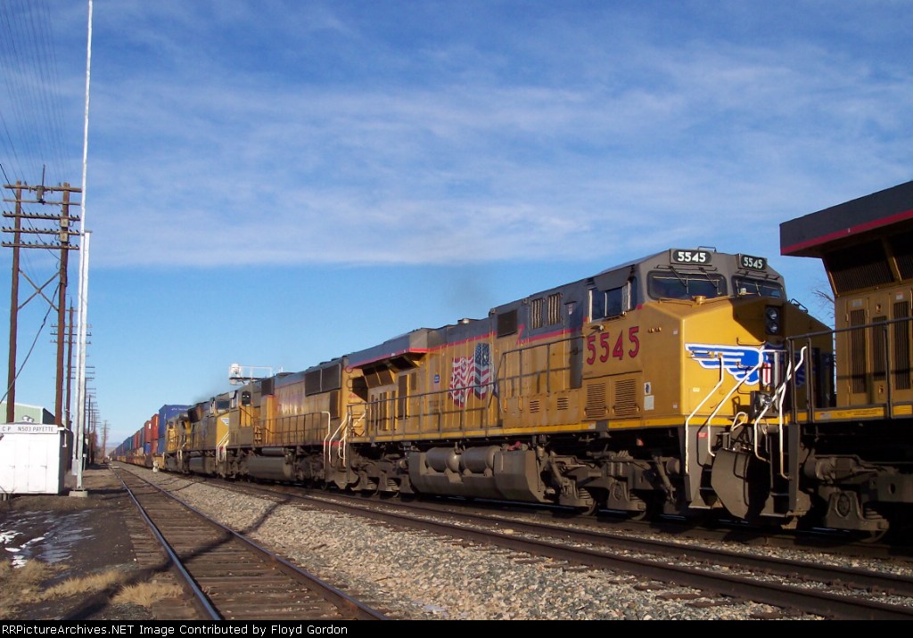 UP 5545 is one of five UP units on double stack train